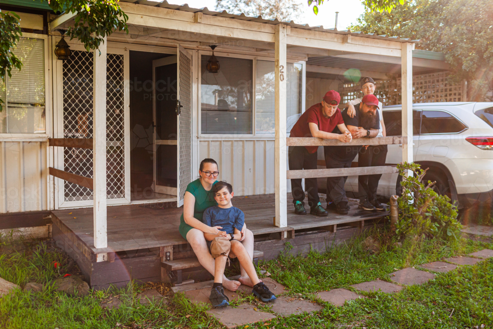 Image of Aboriginal family mum dad and sons together on front veranda ...
