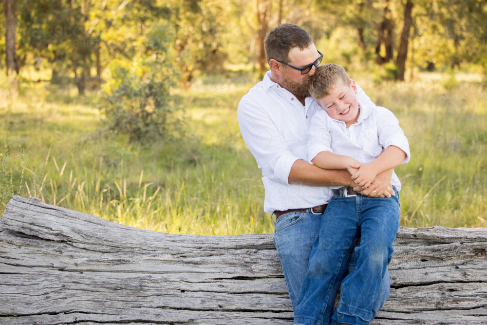 Image of Father and son portrait in rural Australian bush setting ...