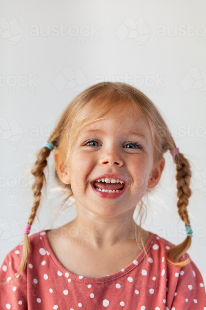 Image of Portrait of smiling young Australian Caucasian child on white ...