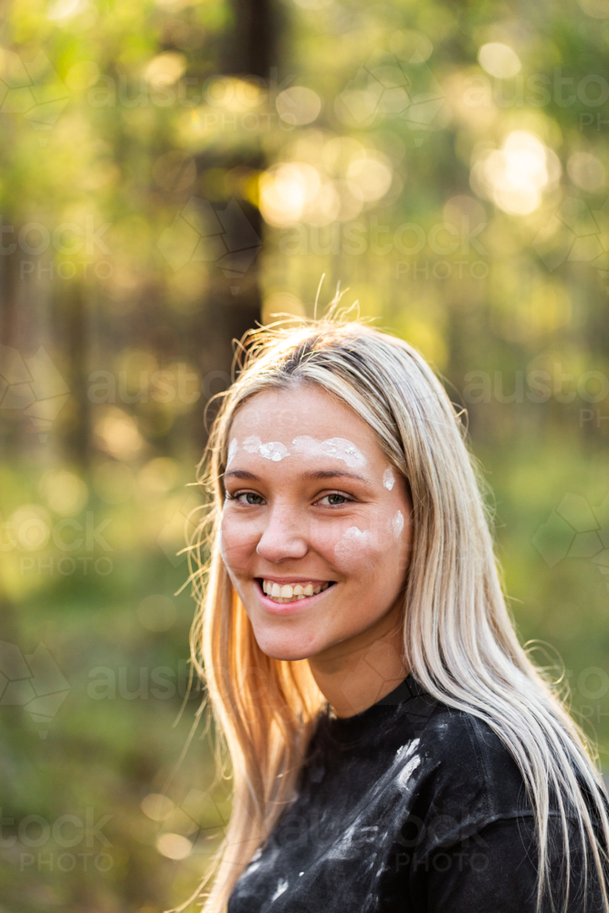 Image of Portrait of smiling young First Nations Australian woman with ...