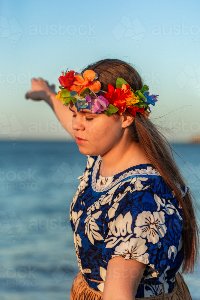 Image of Teen Torres Strait Islander dancer performer girl in traditional floral dress and ...